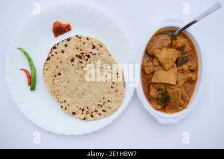 Suran ki sabzi or Jimikand masala curry closeup. Delicious exotic gravy ...