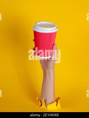 Empty paper coffee cup and a ripped paper bag Stock Photo - Alamy