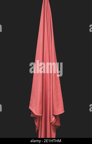 Detail of draped fabric, focus on folds and creases with black ...