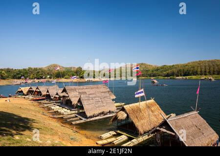 Old bamboo raft is floating on the lake in the morning Stock Photo - Alamy
