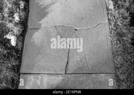 damaged concrete slabs caused by soil structure heave Stock Photo - Alamy