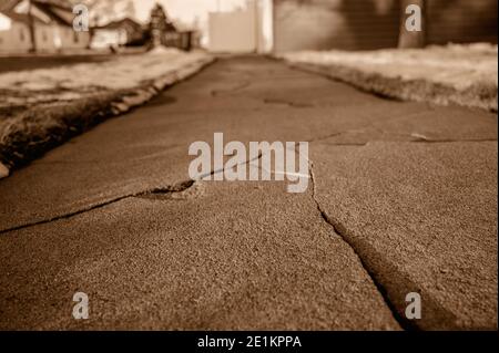 damaged concrete slabs caused by soil structure heave Stock Photo - Alamy