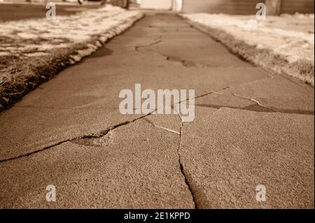 damaged concrete slabs caused by soil structure heave Stock Photo - Alamy