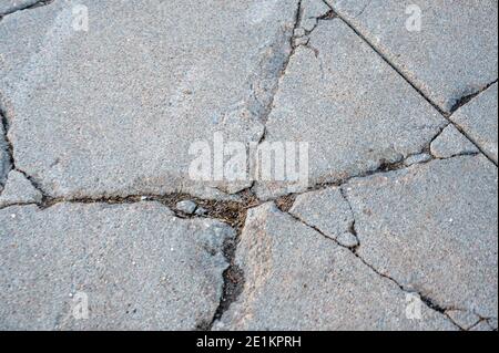 damaged concrete slabs caused by soil structure heave Stock Photo - Alamy