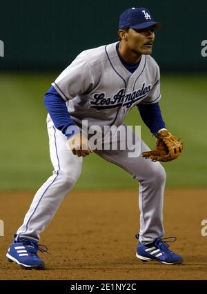 Los Angeles Dodgers' Jose Valentin watches his two-run triple to right ...