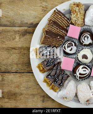Plate full of cookies, different in shape and taste, beautifully ...