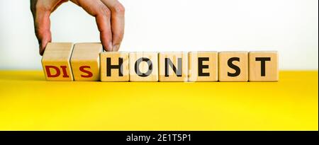 Honest or dishonest symbol. Businessman hand turns cubes and changes ...