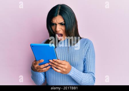 Angry transgender person shouting using a loudspeaker Stock Photo - Alamy