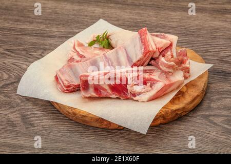 Raw lamb ribs served rosemary for cooking Stock Photo - Alamy