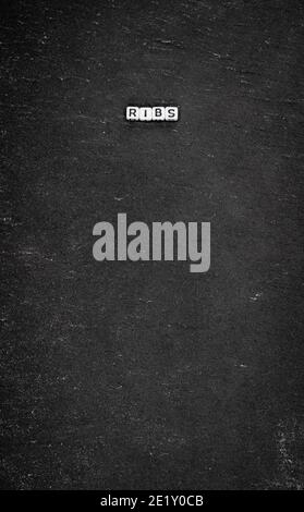 Smoked Barbecue Pork Ribs, Sparerib in kitchen tray. Dark background ...