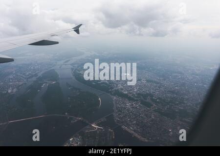 Kiev city with airplane window, Ukraine Stock Photo - Alamy