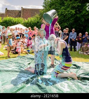Two ladies getting gunged to raise money for charity at a local church ...
