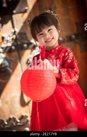 Cute girl with red lanterns Stock Photo - Alamy