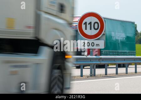 110km/h speed limit sign along the highway Stock Photo - Alamy
