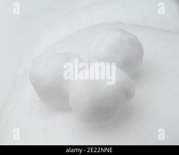 A bunch of Snowballs in snow Stock Photo - Alamy