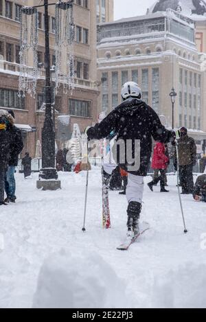 Madrid, Spain - January 9, 2021: People playing with snowballs on a ...