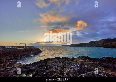 Image of Bouley Bay, Jersey CI, blue sky with cloud, at low tide ...