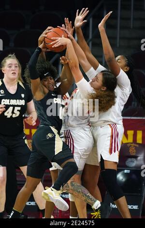 Colorado guard Jaylyn Sherrod, center, is helped off the court after ...