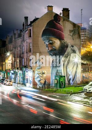 One of Glasgow's best-know murals, by street artist Smug, depicts a ...