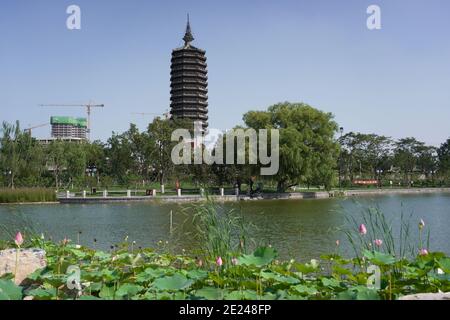 BEIJING, CHINA - JULY 12, 2021 - Pedestrians walk during a rainstorm in ...