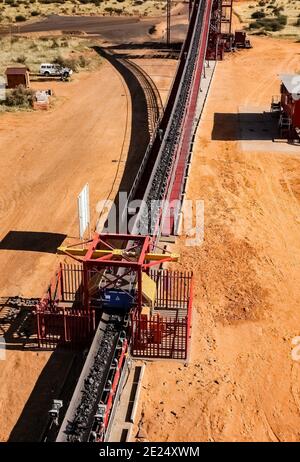 Open pit Manganese Mining - Excavator digging out ore rich rock and ...
