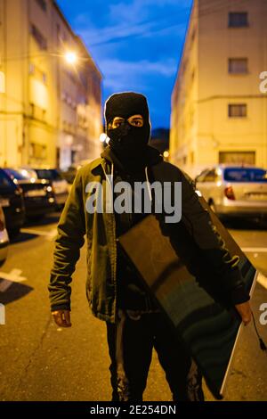 Burglar carrying a stolen TV in the dark night Stock Photo - Alamy
