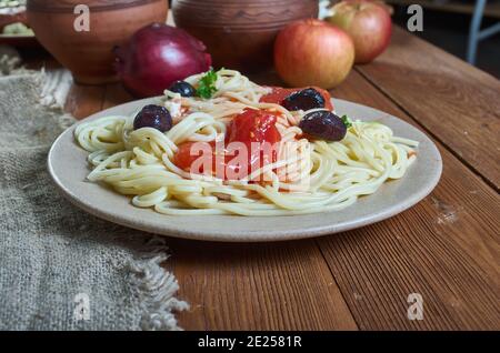 Pilchard puttanesca this tomato-based Italian pasta supper Stock Photo ...
