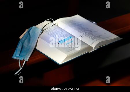 Catholic church. Bible, surgical mask. Covid-19 epidemic. France Stock ...