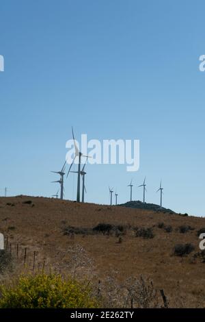 Frontal view of wind turbines in nature in sunshine Stock Photo - Alamy