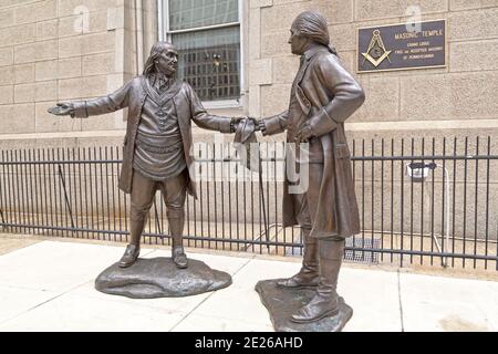 Statue depicting Benjamin Franklin and George Washington outside of the ...