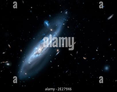 In the centre of this image, taken with the NASA/ESA Hubble Space ...