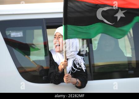 Libyan rebel seen controlling the streets of Tripoli, Libya, on ...