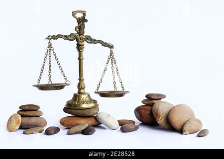 An old scale on stones. The weight in balance. The scale as a measuring ...
