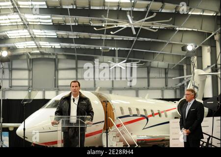 John Travolta unveils the new line of Bombardier's business aircraft at ...