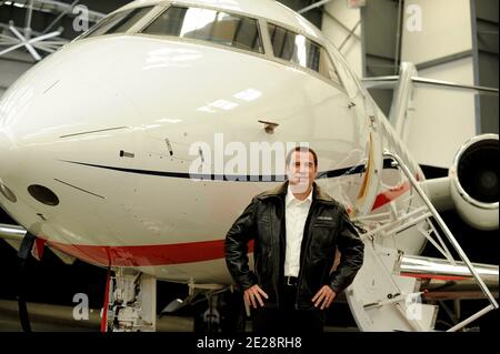 John Travolta unveils the new aircraft livery for the budget airline ...