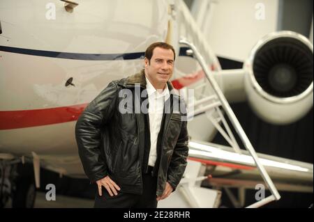 John Travolta unveils the new aircraft livery for the budget airline ...