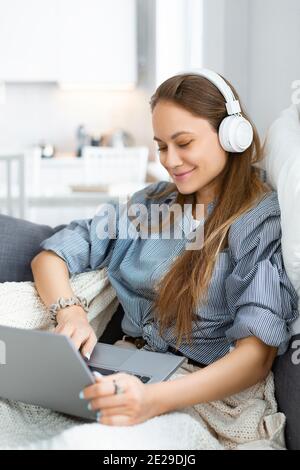 Freelance woman using laptop concept Stock Photo - Alamy