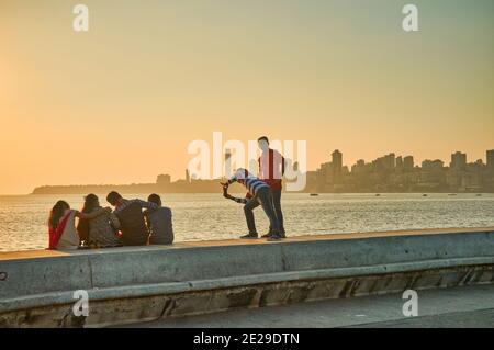 Late afternoon at Marine Drive, Mumbai, India, a boardwalk lining the ...