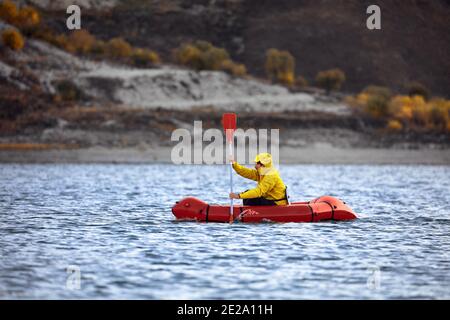 Packraft (one-person light raft used for expedition or adventure racing ...