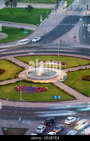 Qatar, Doha, Traffic at roundabout infont of the Museum of Islamic Art ...