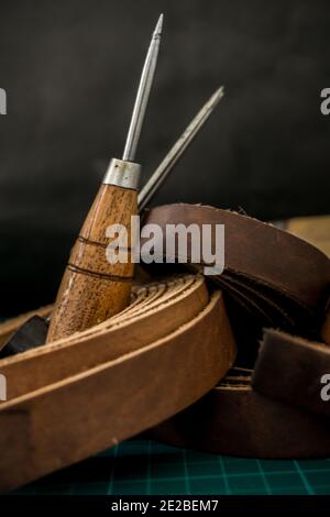 Vertical shot of the leather craftsman's tool box Stock Photo - Alamy