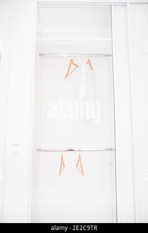 Wardrobe with empty ramps. Sale in the store. Emptiness.Modern wardrobe ...