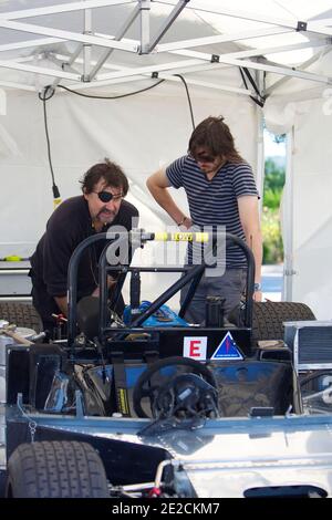 Scottish drummer Neil Primrose of Travis band, takes part in a motor ...