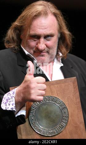 French actor Gerard Depardieu poses after being awarded by the Prix ...