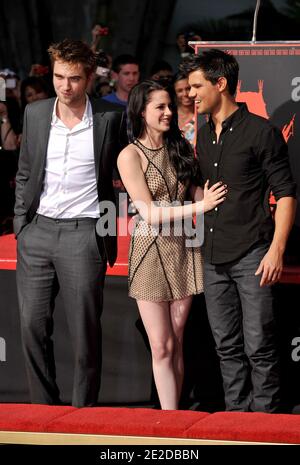 Actor Robert Pattinson, actress Kristen Stewart and actor Taylor ...