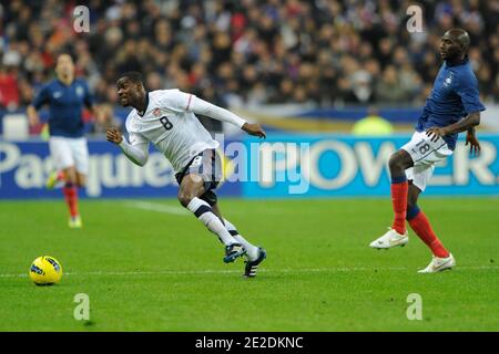 France's Alou Diarra battling USA's Clint Dempsey during a friendly ...