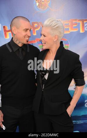 Carey Hart, Pink during the 'Happy Feet Two' World Premiere, held at ...