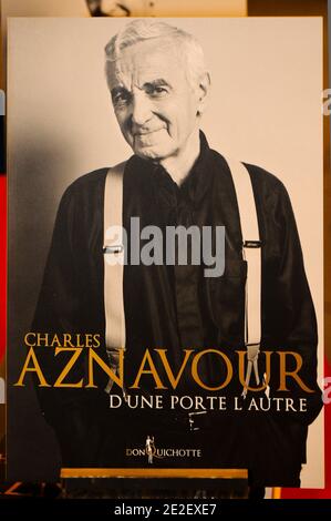 Singer Charles Aznavour signs copies of his new book 'D'Une Porte A L ...