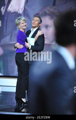 Sophie Davant and Nagui at the taping of Telethon 2011 on December 3 ...