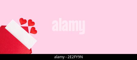 Envelope and red hearts on pink background. Valentine's day, love ...